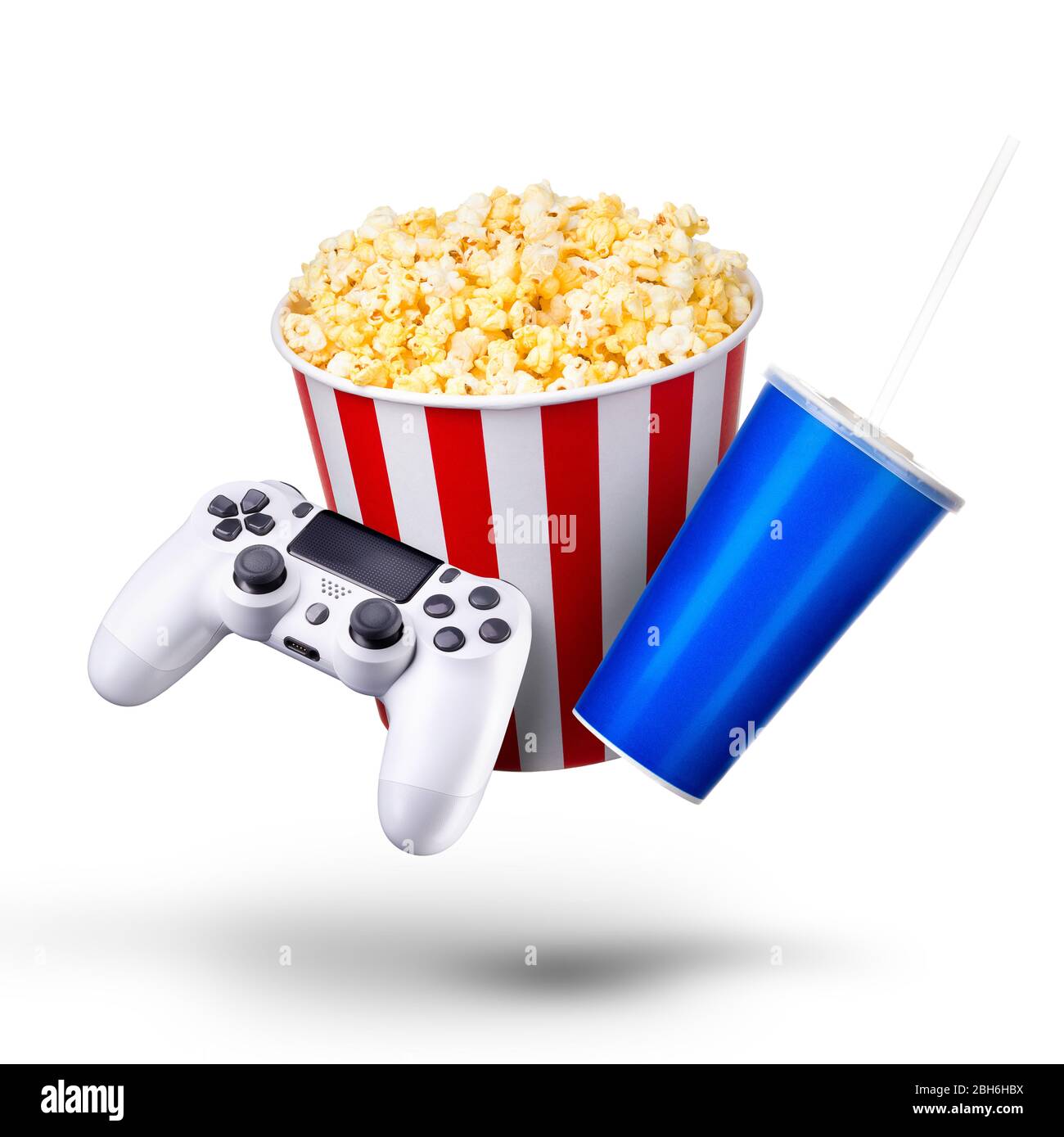 Flying popcorn, drink and video game joystick gamepad isolated on a ...