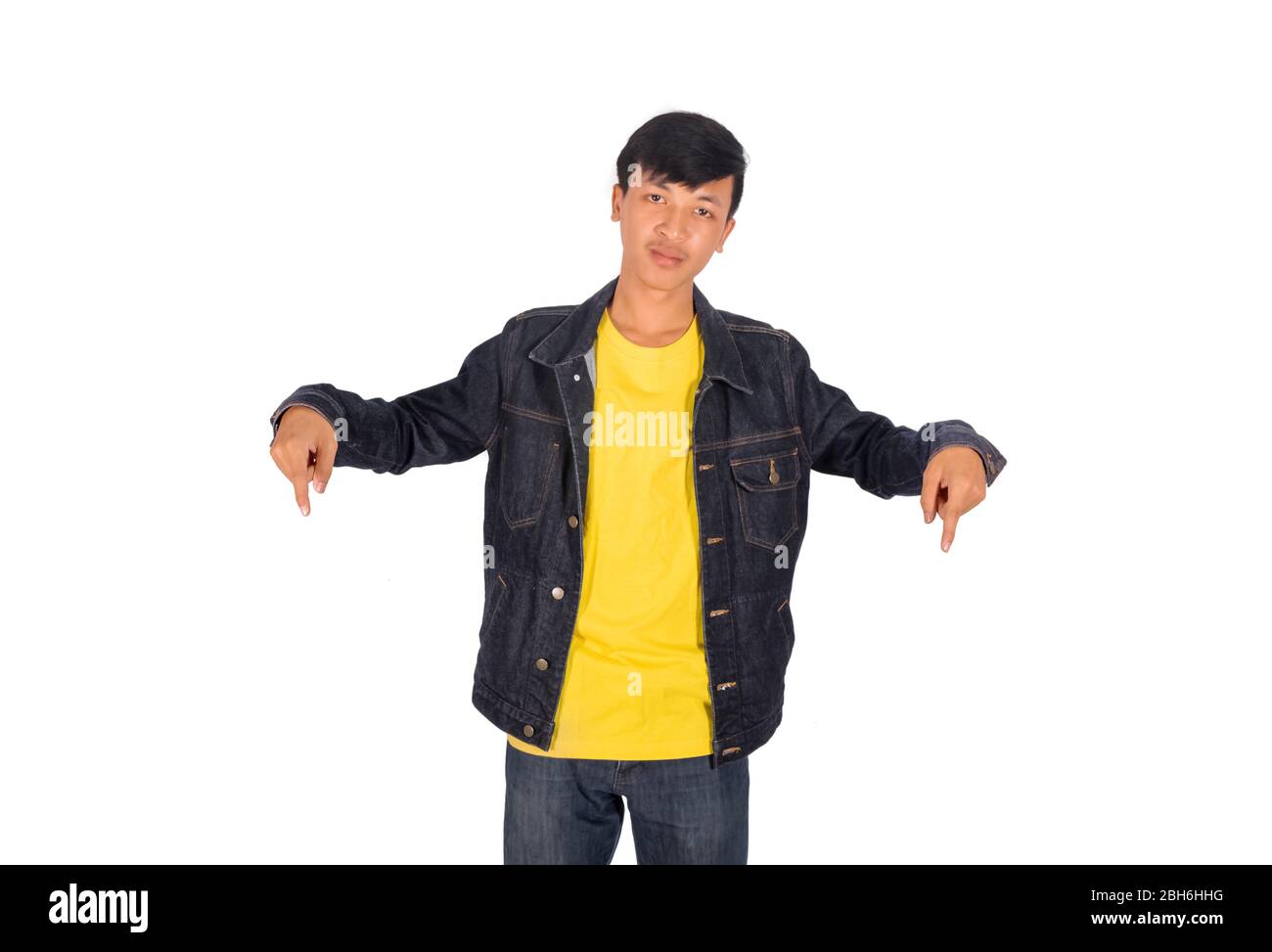 The photo of A man is pointing to the ground Stock Photo - Alamy