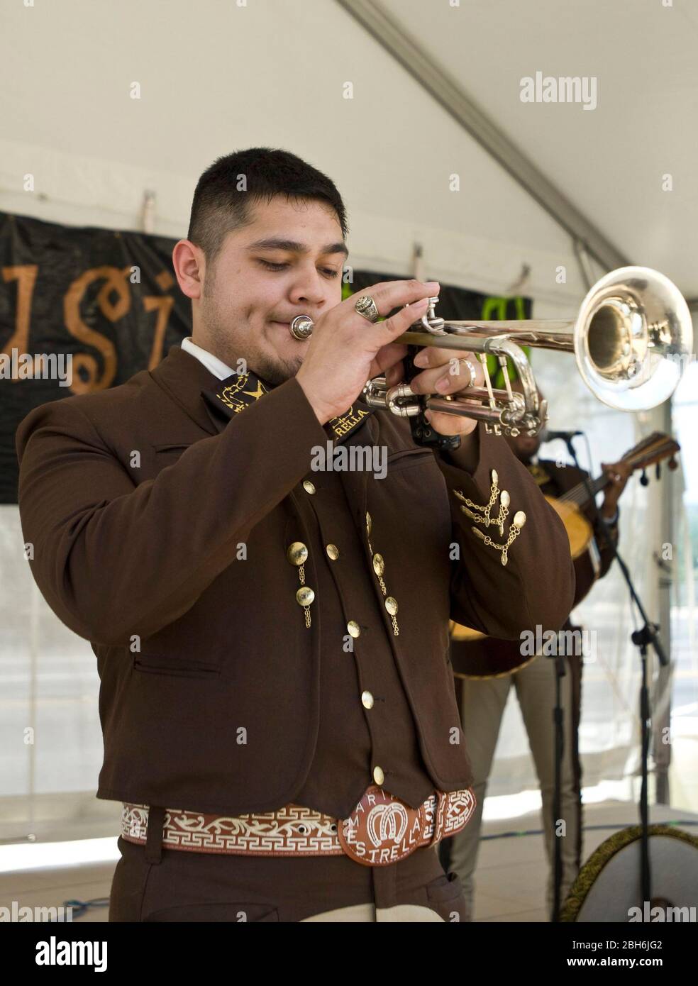 Austin Texas USA, 2009: Young trumpet player in traditional Mexican ...