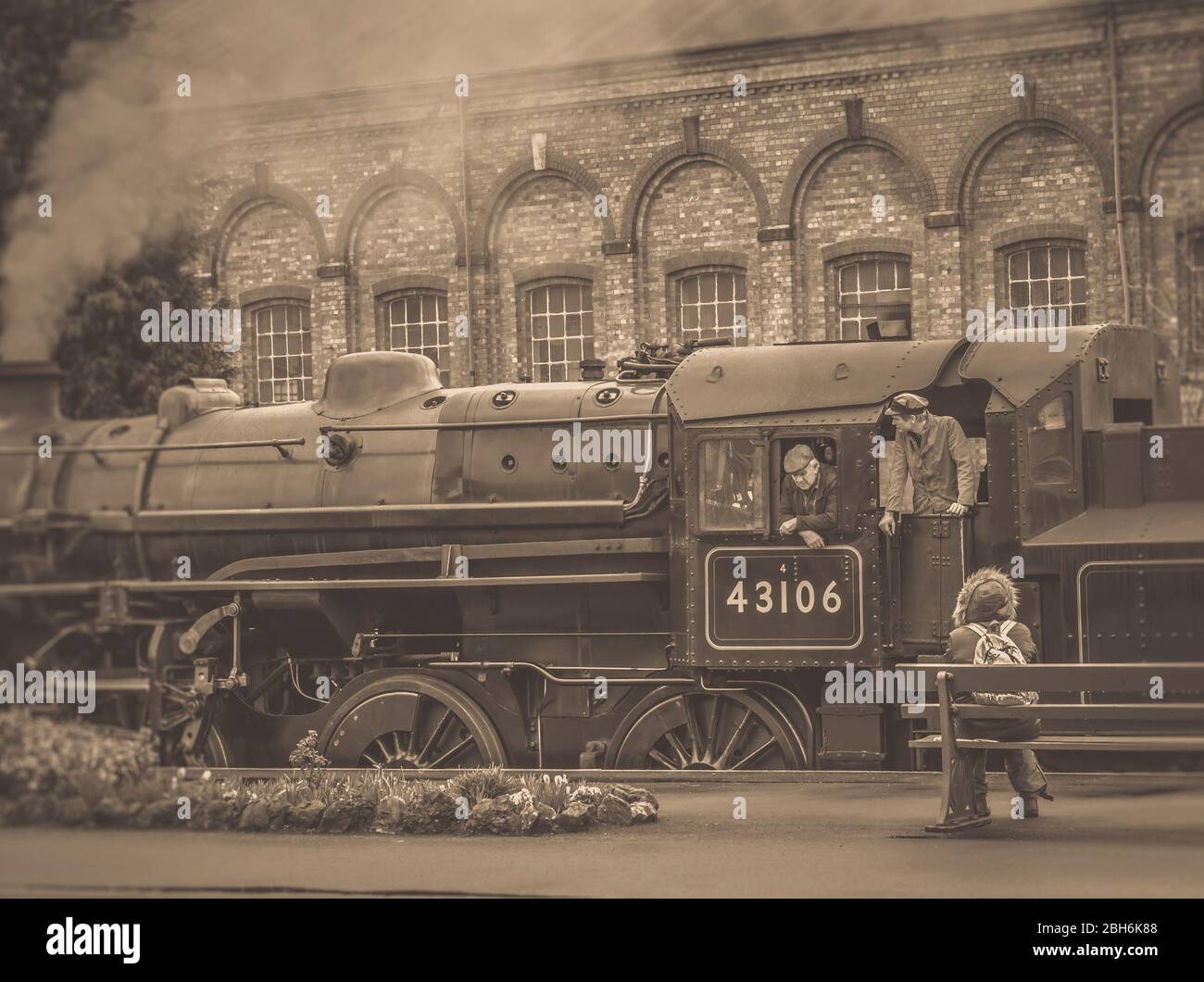 Sepia view of vintage UK steam train 43106 arriving at Kidderminster ...