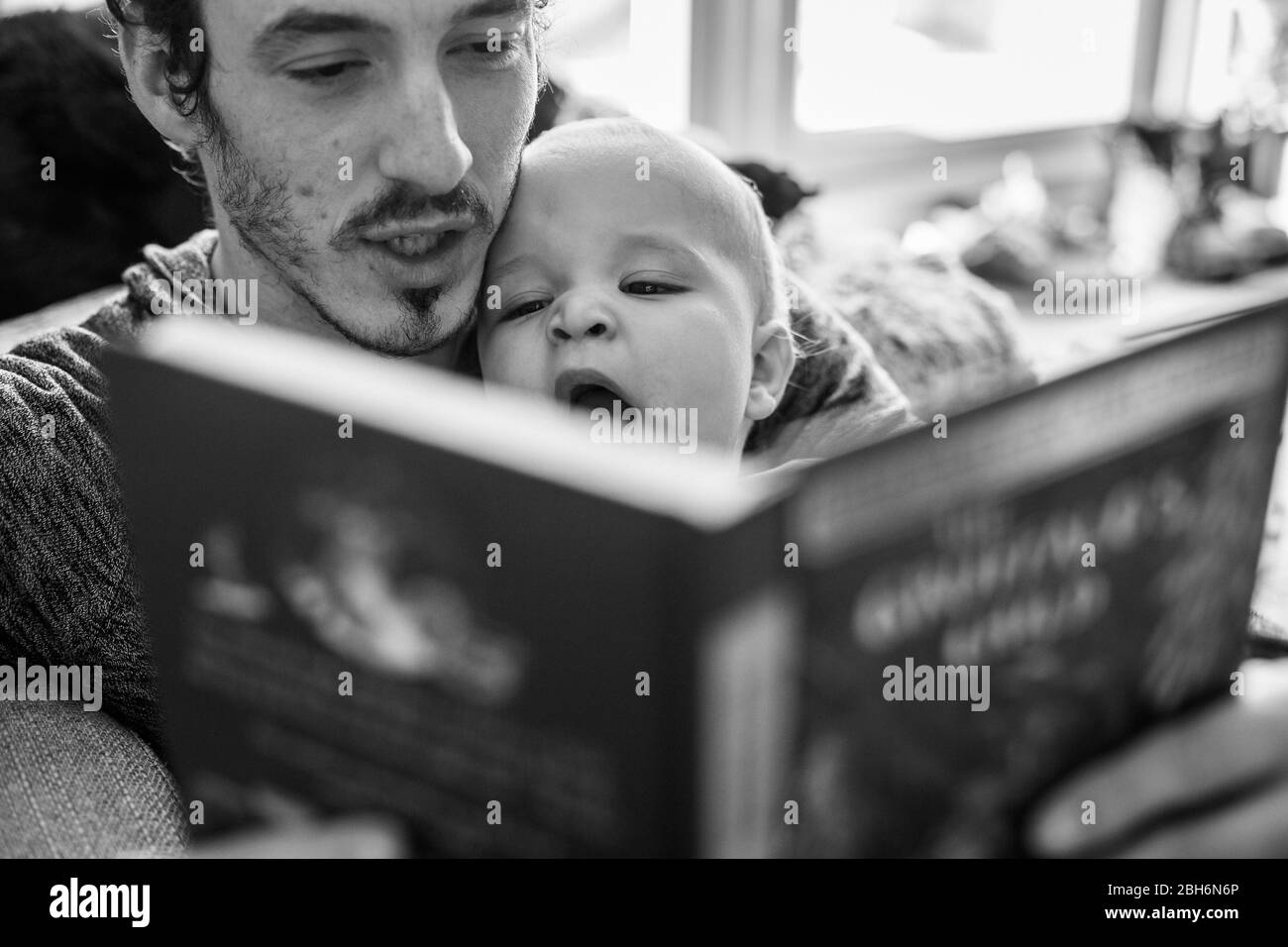 Father son book Black and White Stock Photos & Images - Alamy