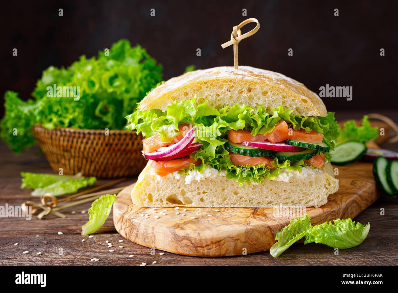 Sandwiches with homemade ciabatta bread, salted salmon fish, feta ...