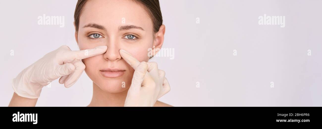 Doctor glover near patient nose. Treatment test Stock Photo - Alamy