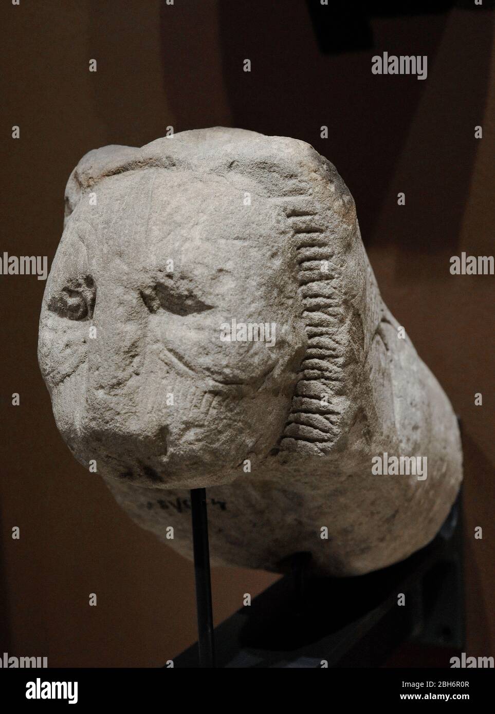 Fragment of a block in a shape of a lion. 6th century AD. Limestone ...