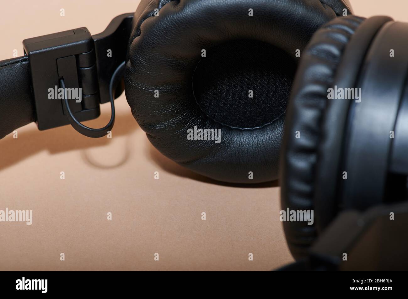 Modern digital headset close up view on beige color background Stock ...
