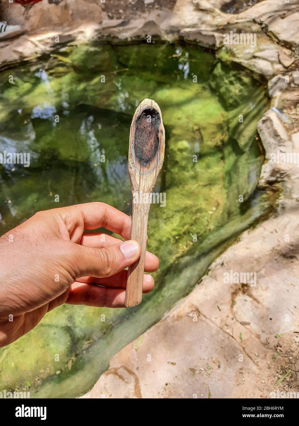 Handmade survival wooden spoon that made it in wild Stock Photo - Alamy