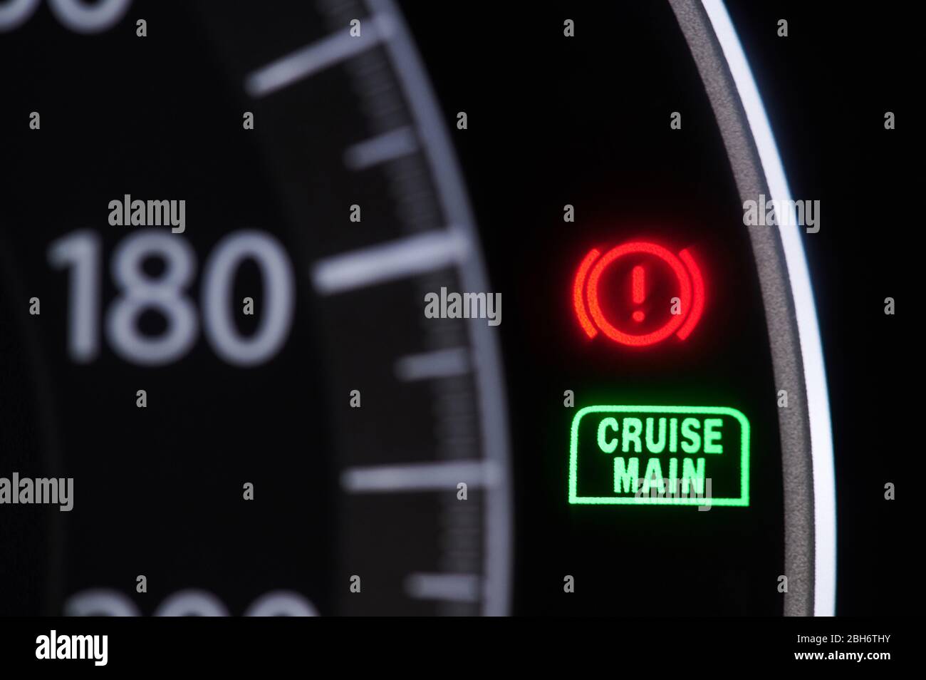 Macro of warning signs in car dashboard close up view Stock Photo - Alamy