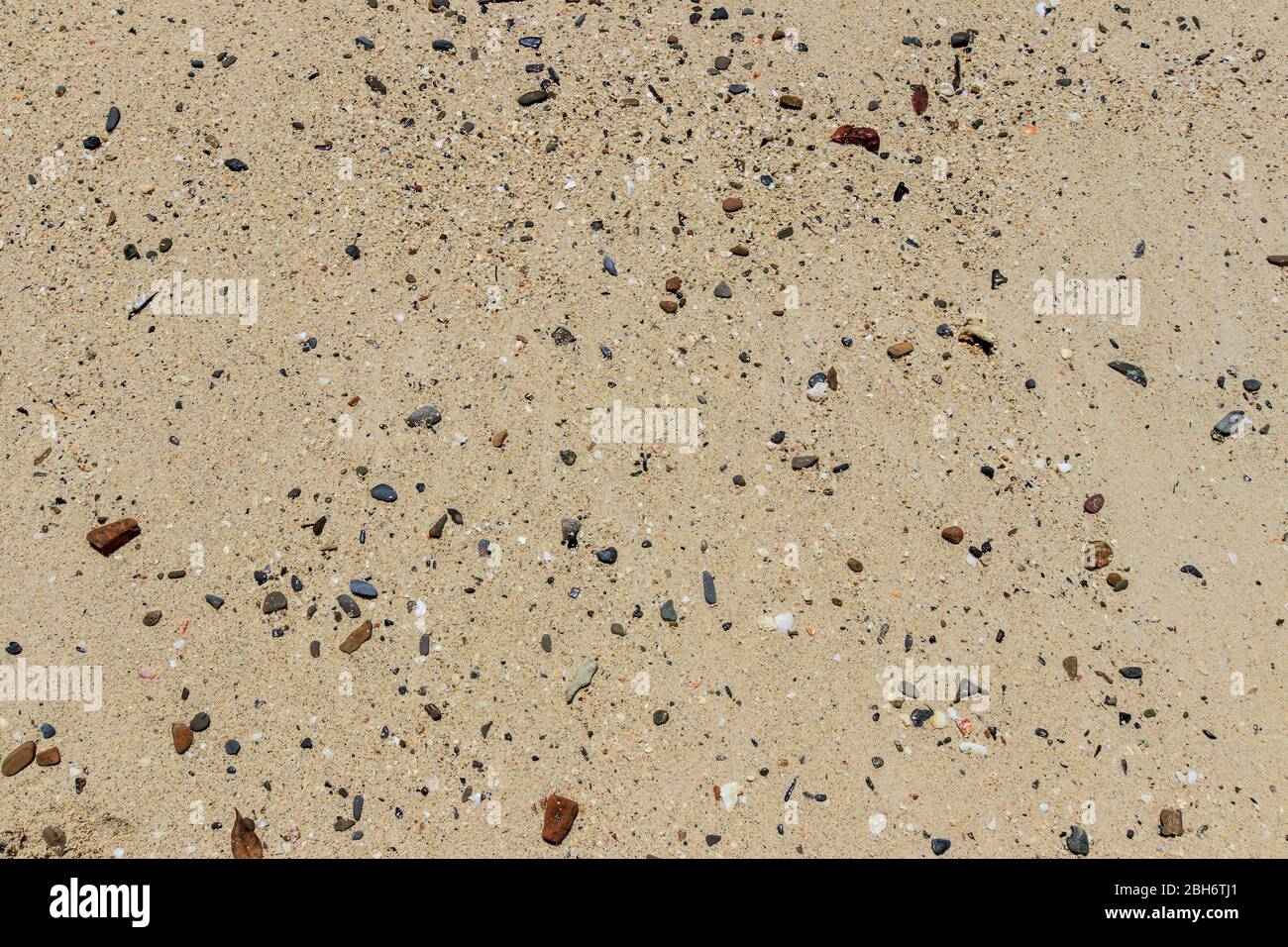 Sandy beach with stones. Detailed sand texture. Background for design ...