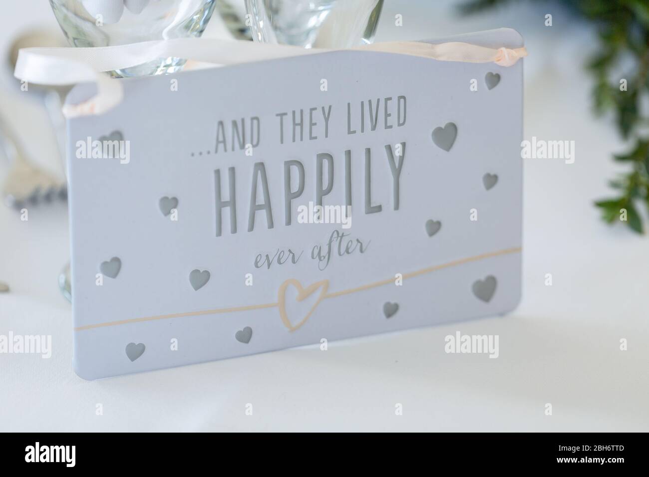 And they lived happily ever after white sign with love hearts wedding ...