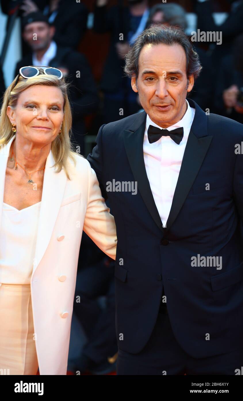 VENICE, ITALY - SEPTEMBER 02: Alexandre Desplat and Dominique Lemonnier ...