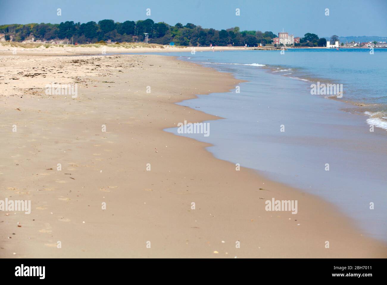 Usually packed beach owned by the National Trust at Shell Bay Dorset ...