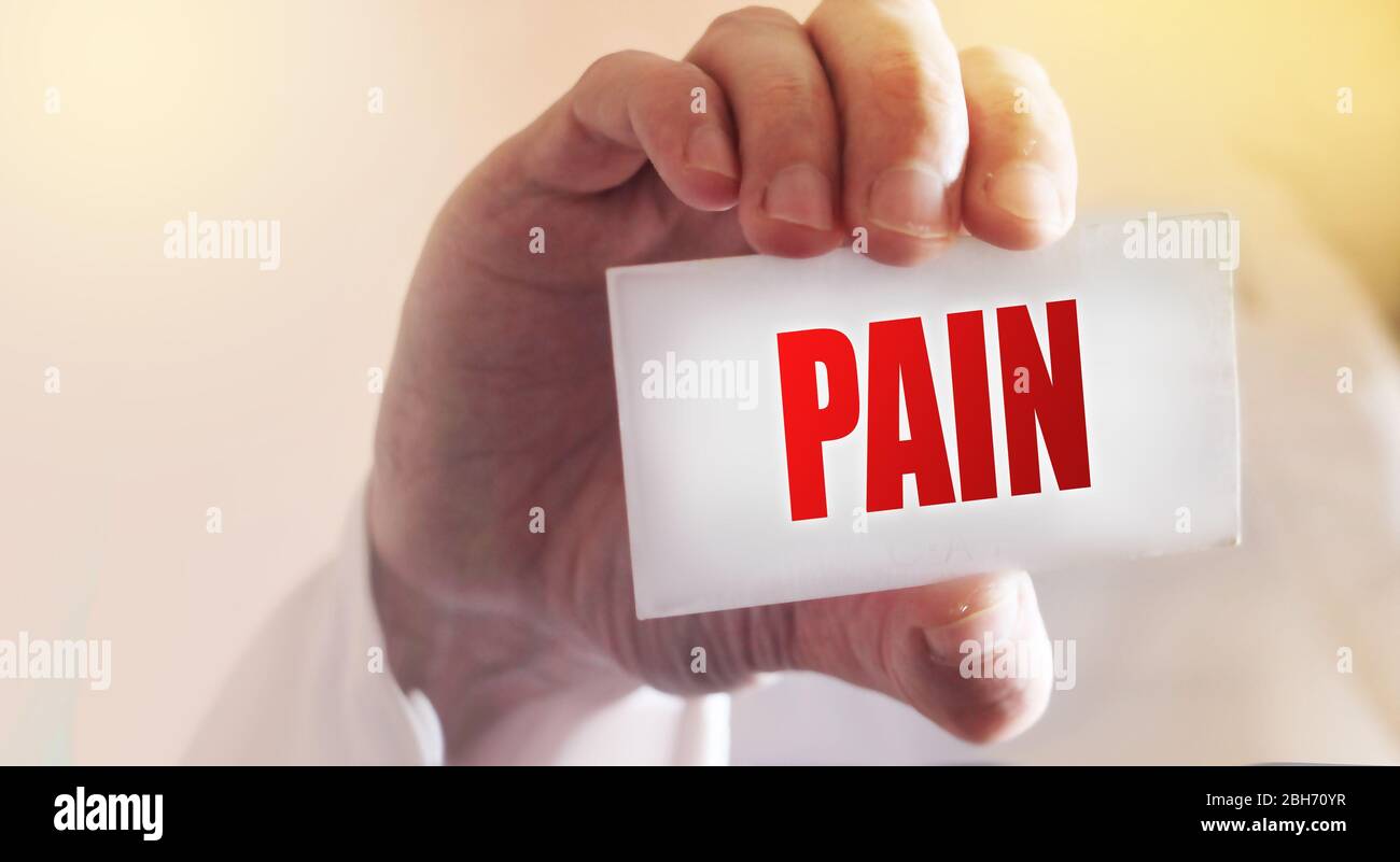 Pain card in hands of Medical Doctor. Healthcare concept Stock Photo ...