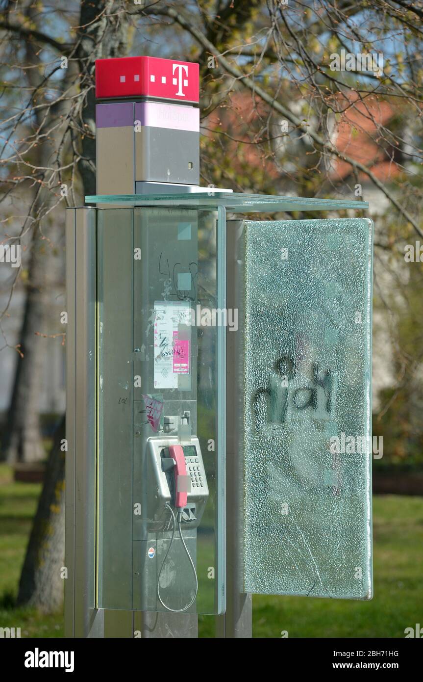 Grimma, Germany. 16th Apr, 2020. The safety glass of a telephone booth ...