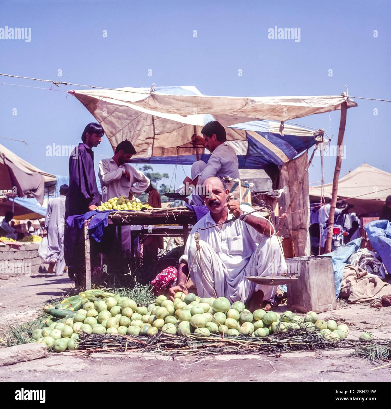 Pakistan, Islamabad, small business market traders with local people ...