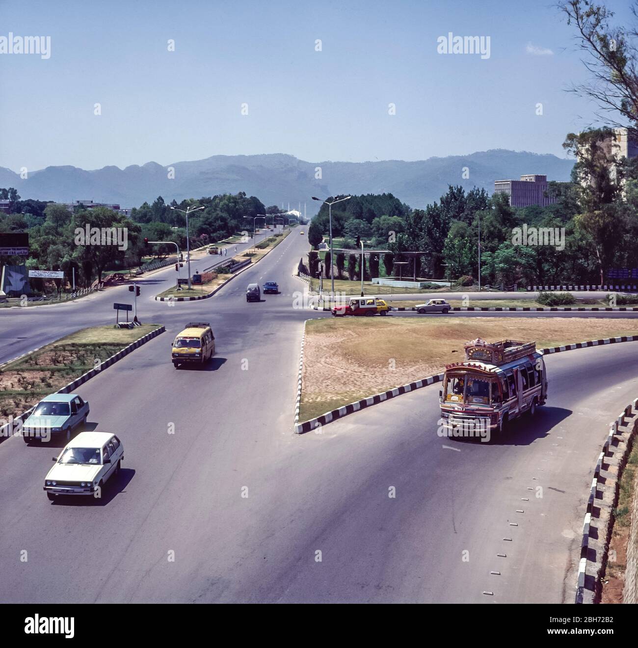 Pakistan, Islamabad street scene illustrating Islamabad's wide roads ...