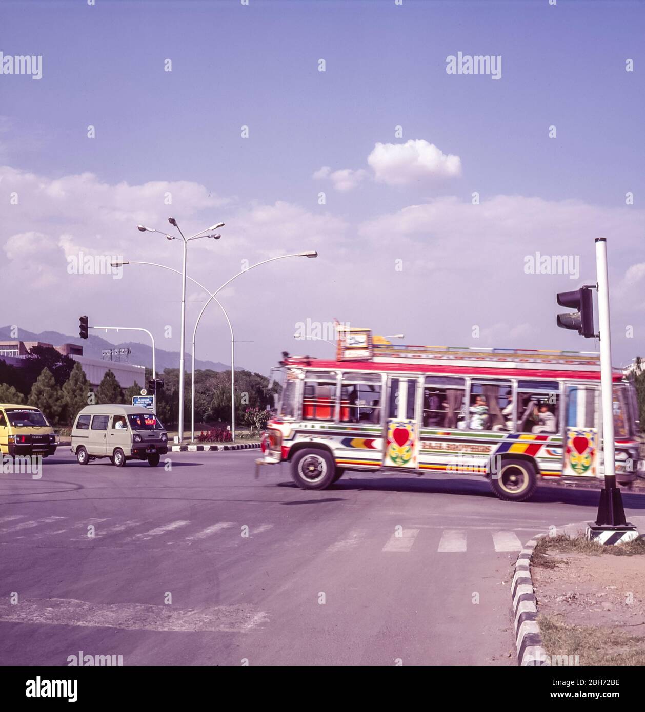Pakistan, Islamabad street scene illustrating Islamabad's wide roads ...