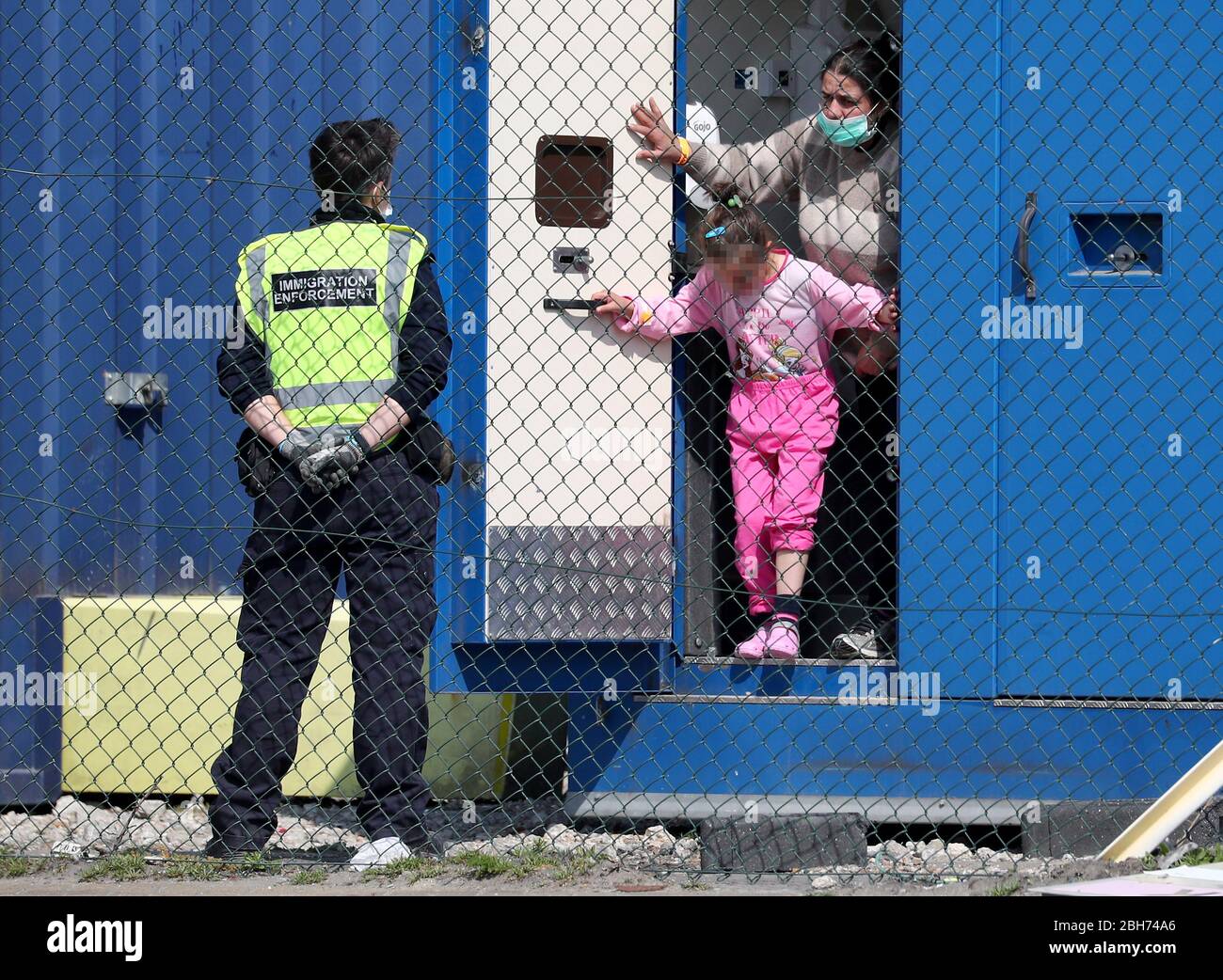 Immigration enforcement officer helps hi-res stock photography and ...