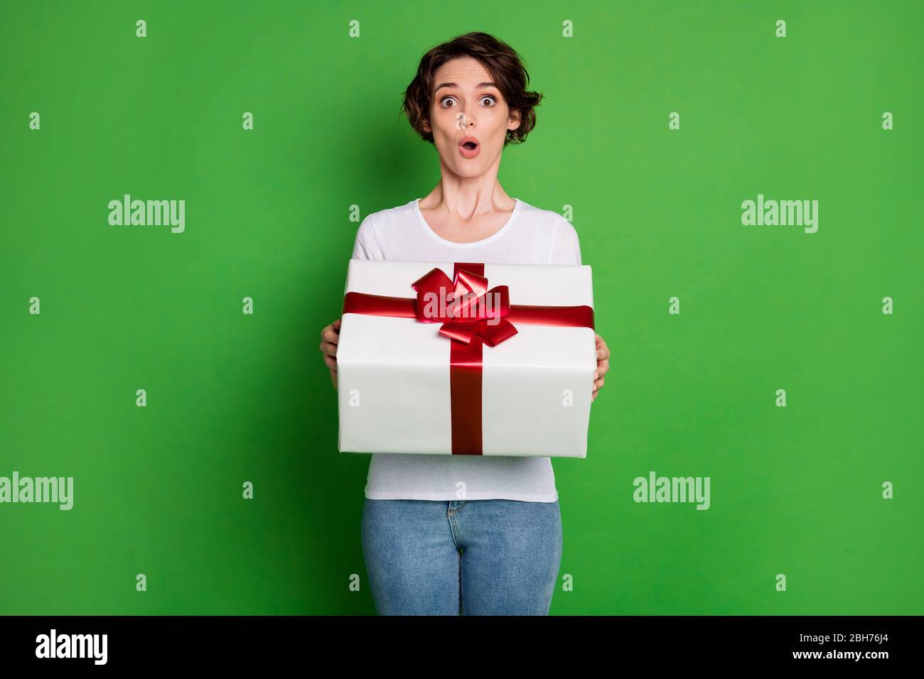 Photo of beautiful lady wavy short hairdo hold large gift box open ...