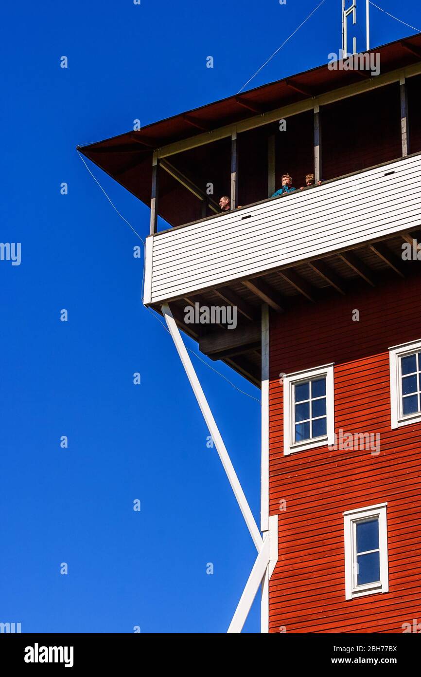 People looking out of a lookout tower Stock Photo - Alamy