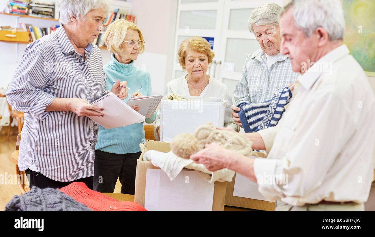 Man sorting wardrobe hi-res stock photography and images - Alamy