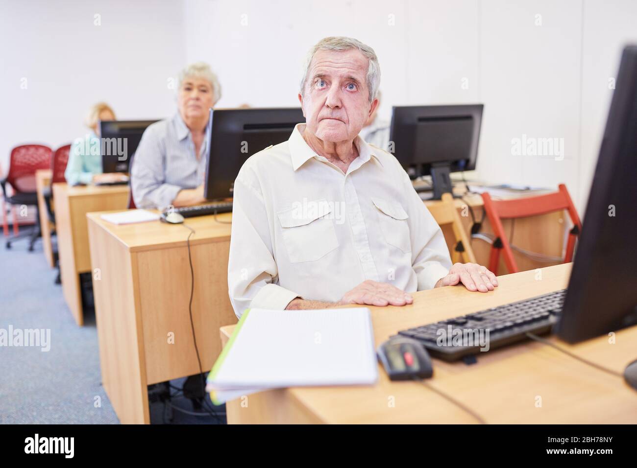 Seniors from the retirement home learn to use the Internet in a ...