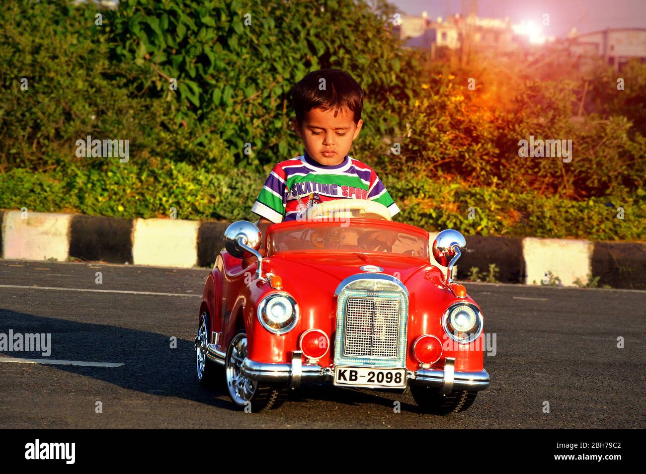Indian boy driving a car hi-res stock photography and images - Alamy