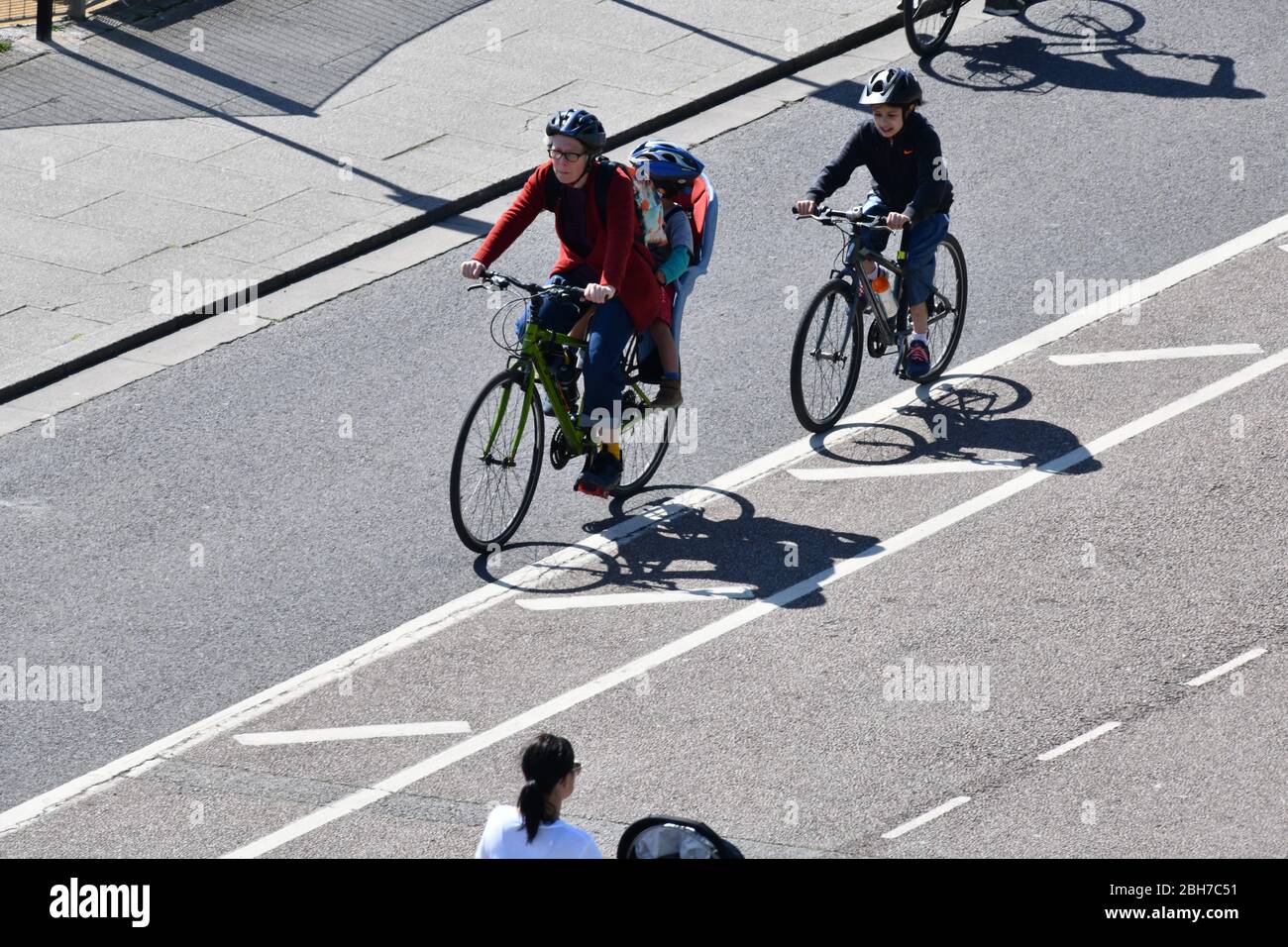 Cycling along Brighton sea front during covid19 pandemic Stock Photo ...