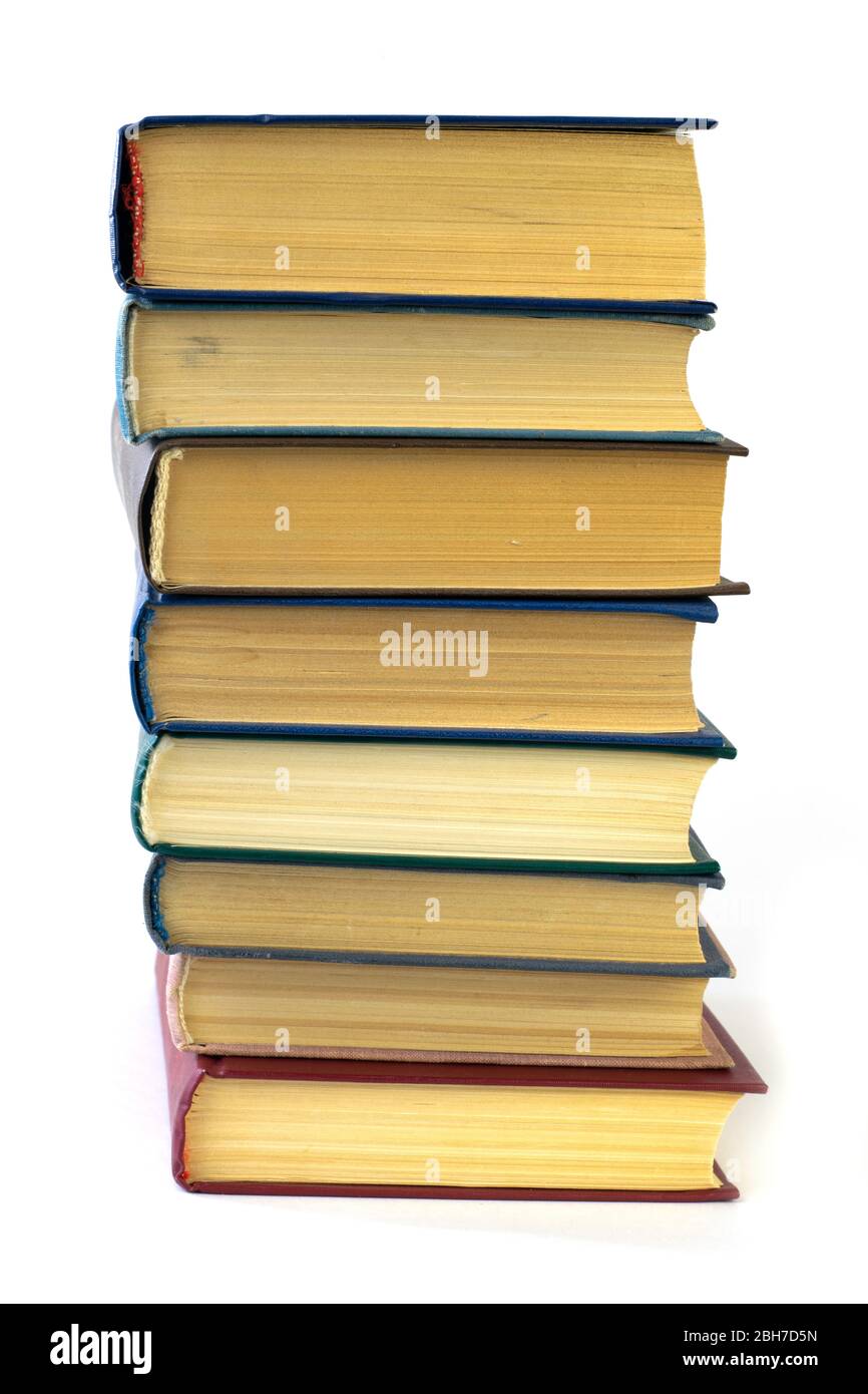 stack of eight books isolated on white background Stock Photo - Alamy