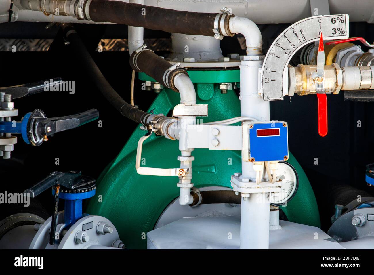pump compartment of a fire engine with a pump and communications ...