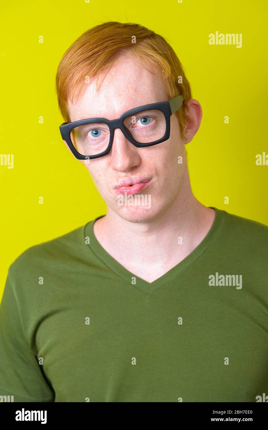 Face of nerd man with red hair wearing eyeglasses Stock Photo - Alamy