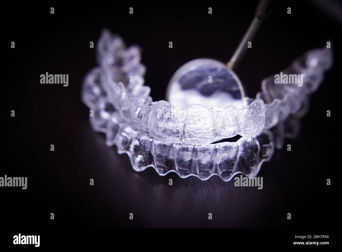 Transparent plastic dental retainer teeth alignment corrector with ...