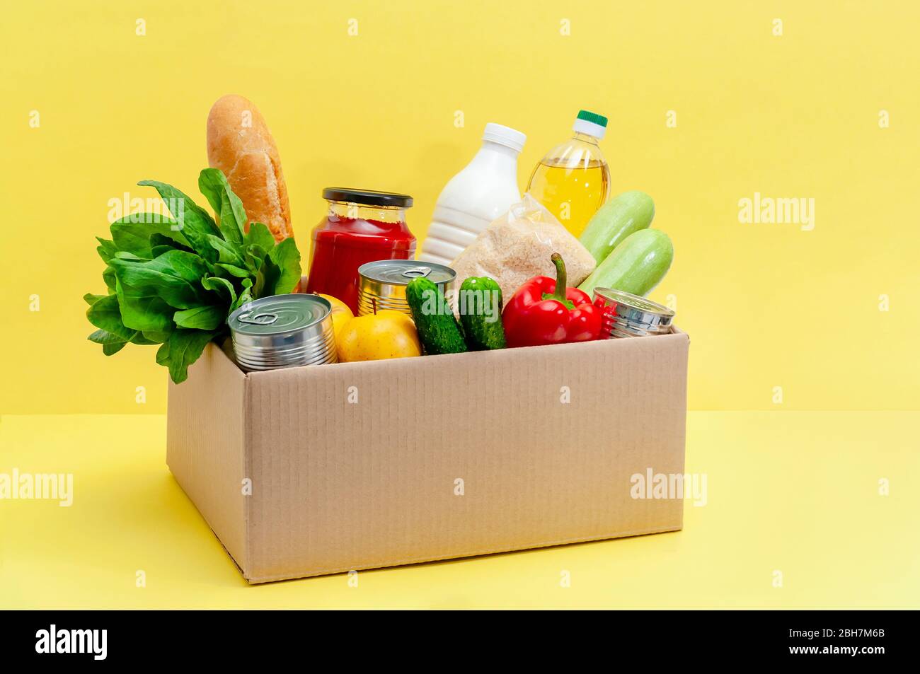 Donation Box with Supplies Food for People in Isolation on Yellow ...
