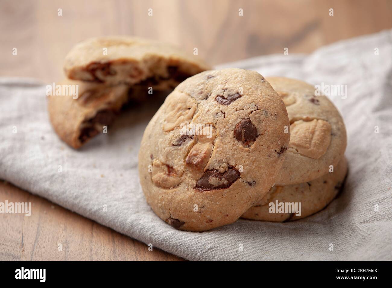 freshly baked cookies placed on a delicate fabric and photographed on a ...