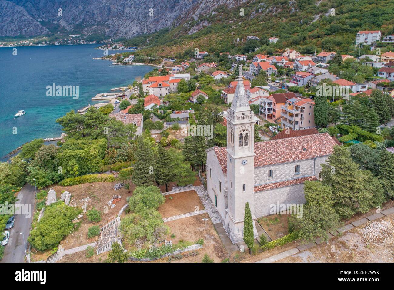 Aerial view of the village of Dobrota and St.Eustace's Church ...