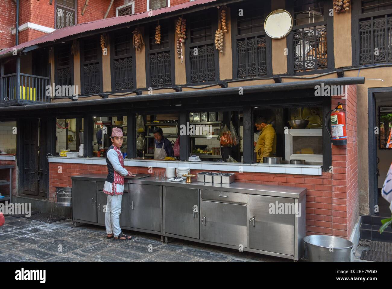 Tansen, Nepal - 14 January 2020: waiter of a restaurant at Tansen in ...