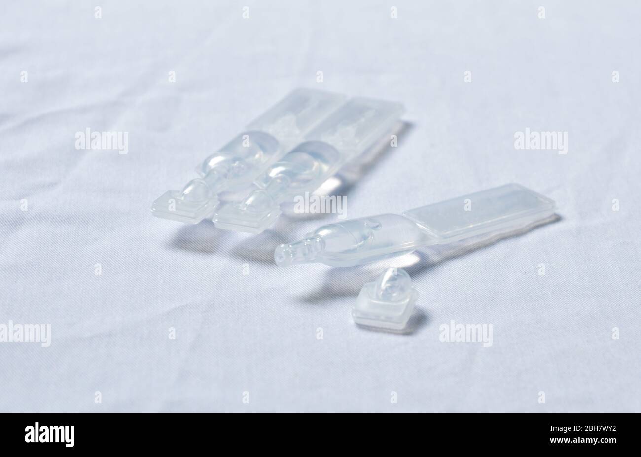 artificial tears tube for moist eyes on white fabric background Stock ...