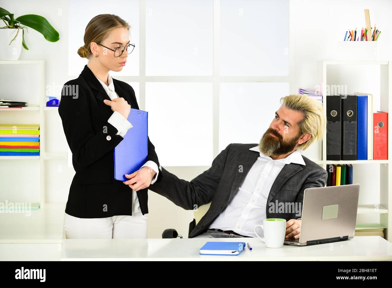 boss and employee. successful partnership. man and woman brainstorming ...