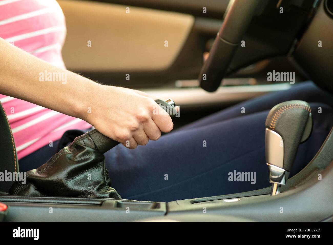 Close up of female driver hand holding hand brake in a car Stock Photo ...