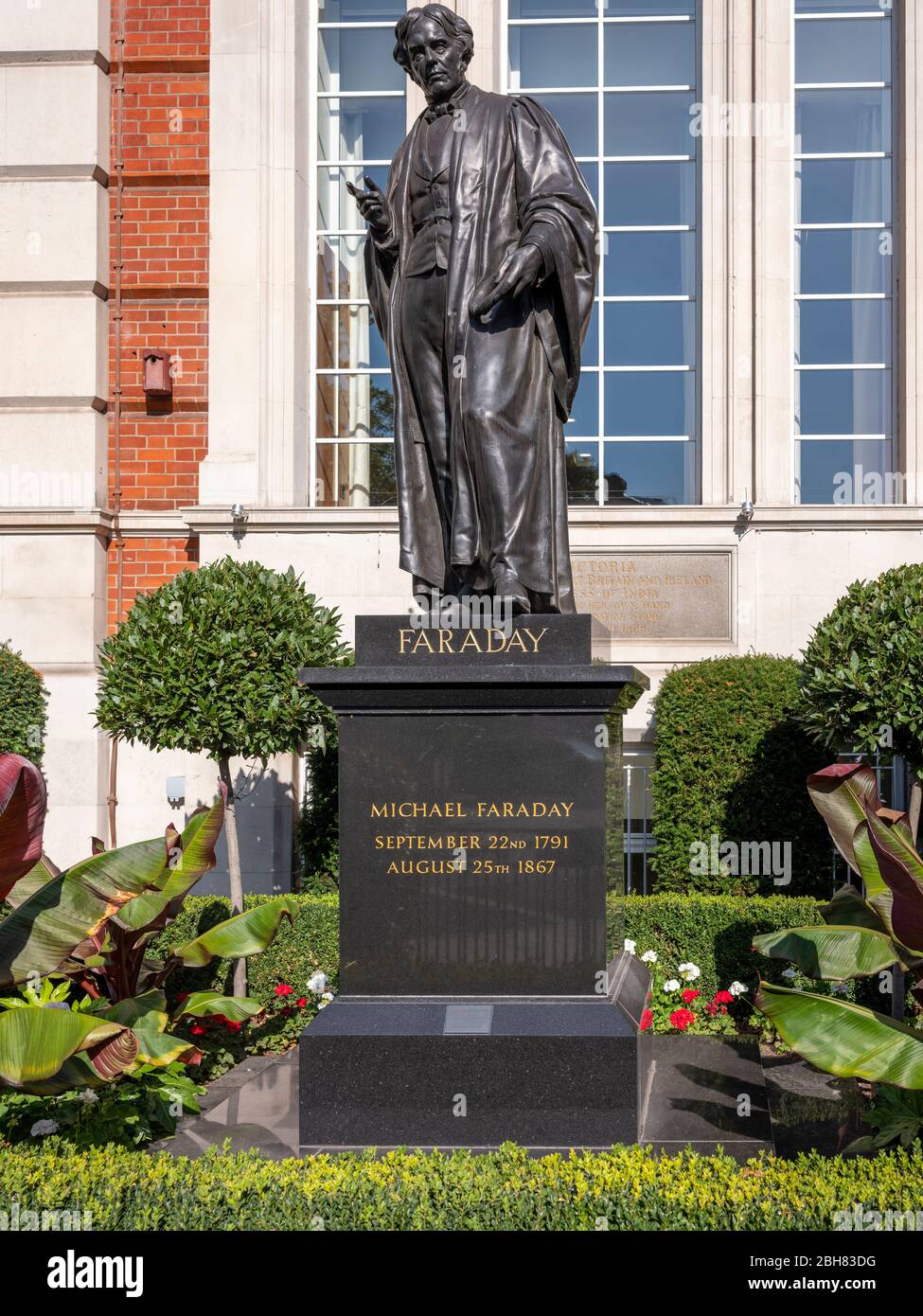 Statue of pioneering physicist and electrical engineer Michael Faraday ...