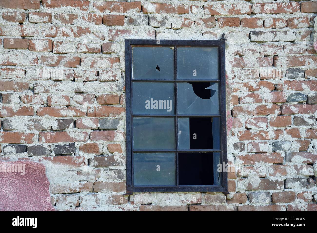 Ancient metal window on old collapsed house Stock Photo - Alamy