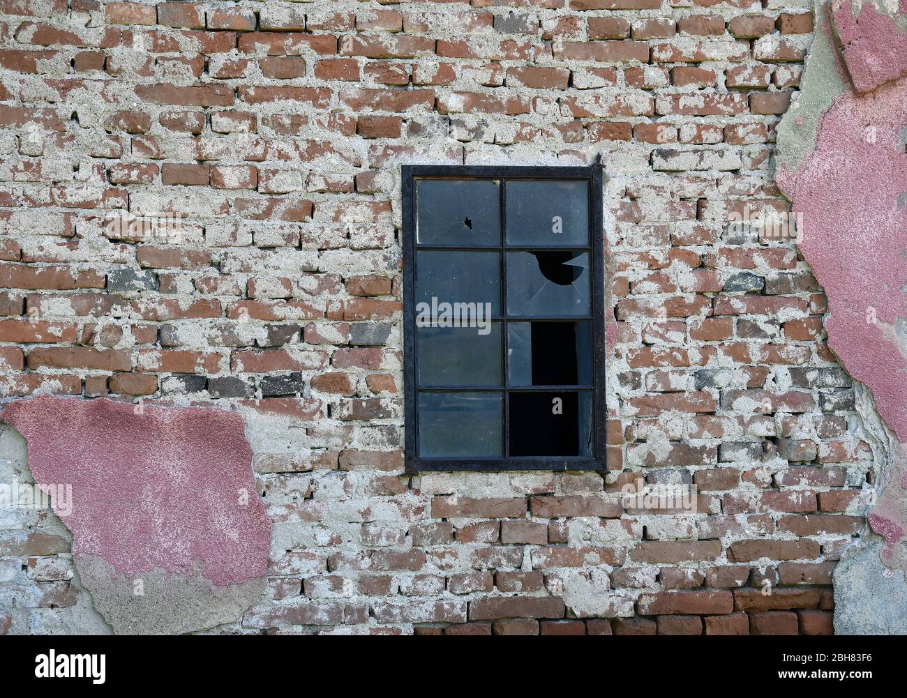 Ancient metal window on old collapsed house Stock Photo - Alamy