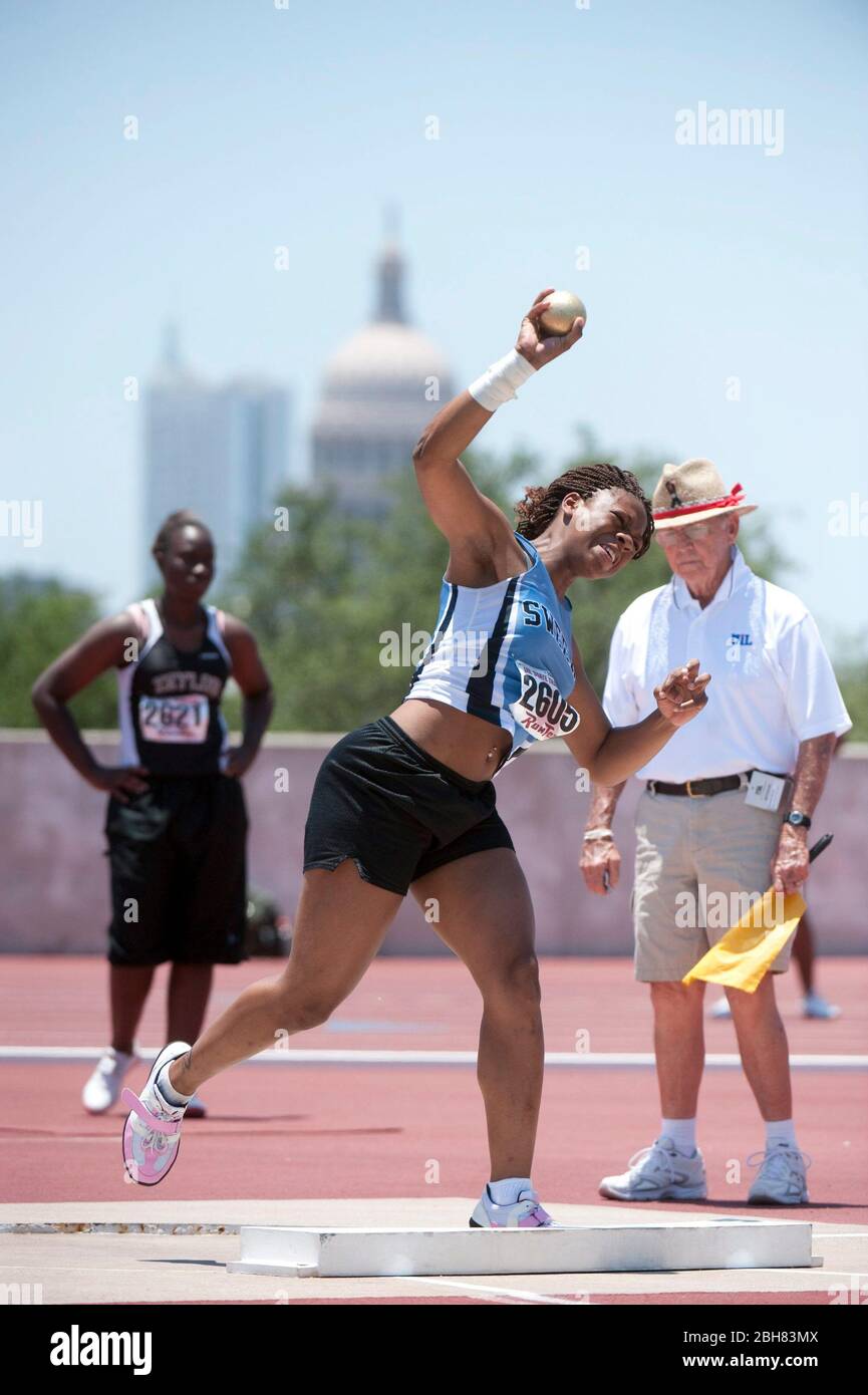 Austin Texas USA, June 6, 2009: Female shot putter prepares to throw in ...