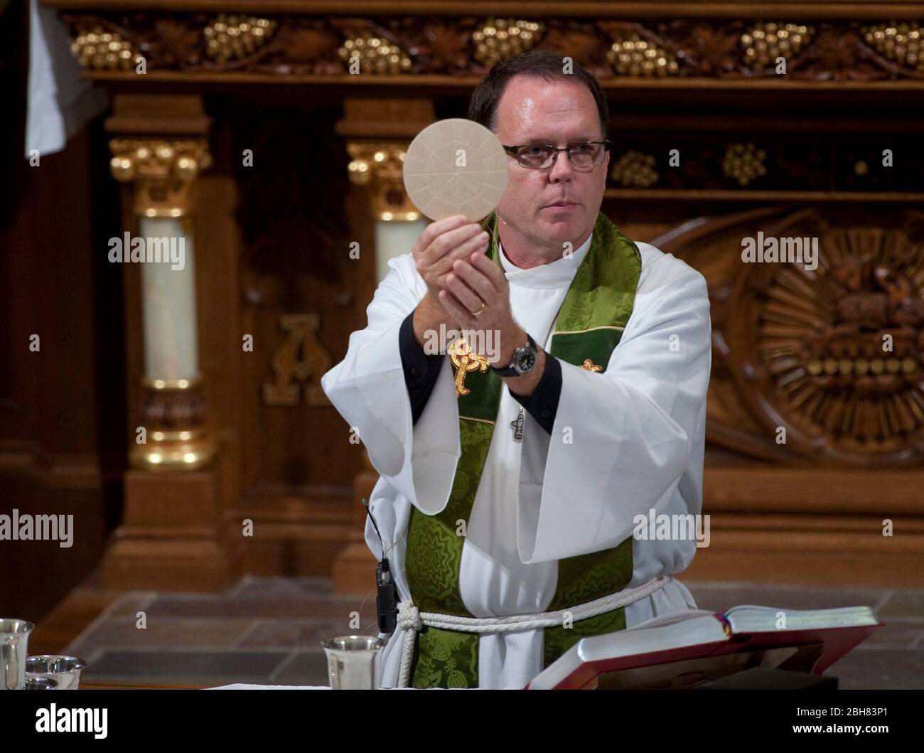 Pastor conducting service hi-res stock photography and images - Alamy