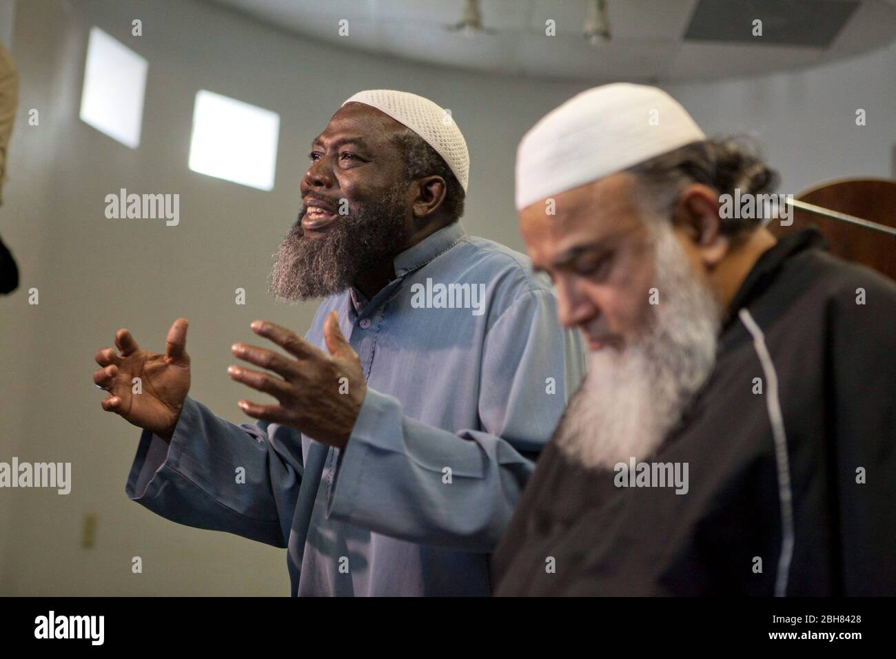 Killeen, Texas USA, November 9, 2009: Muslim Osman Dunquah (l) and imam ...