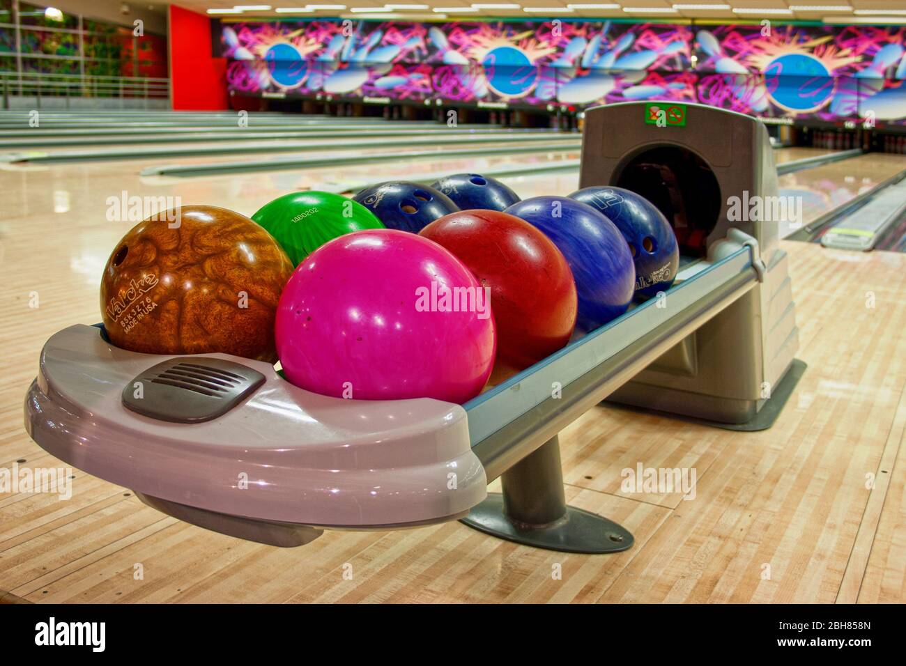 Bowling balls in rack hi-res stock photography and images - Alamy