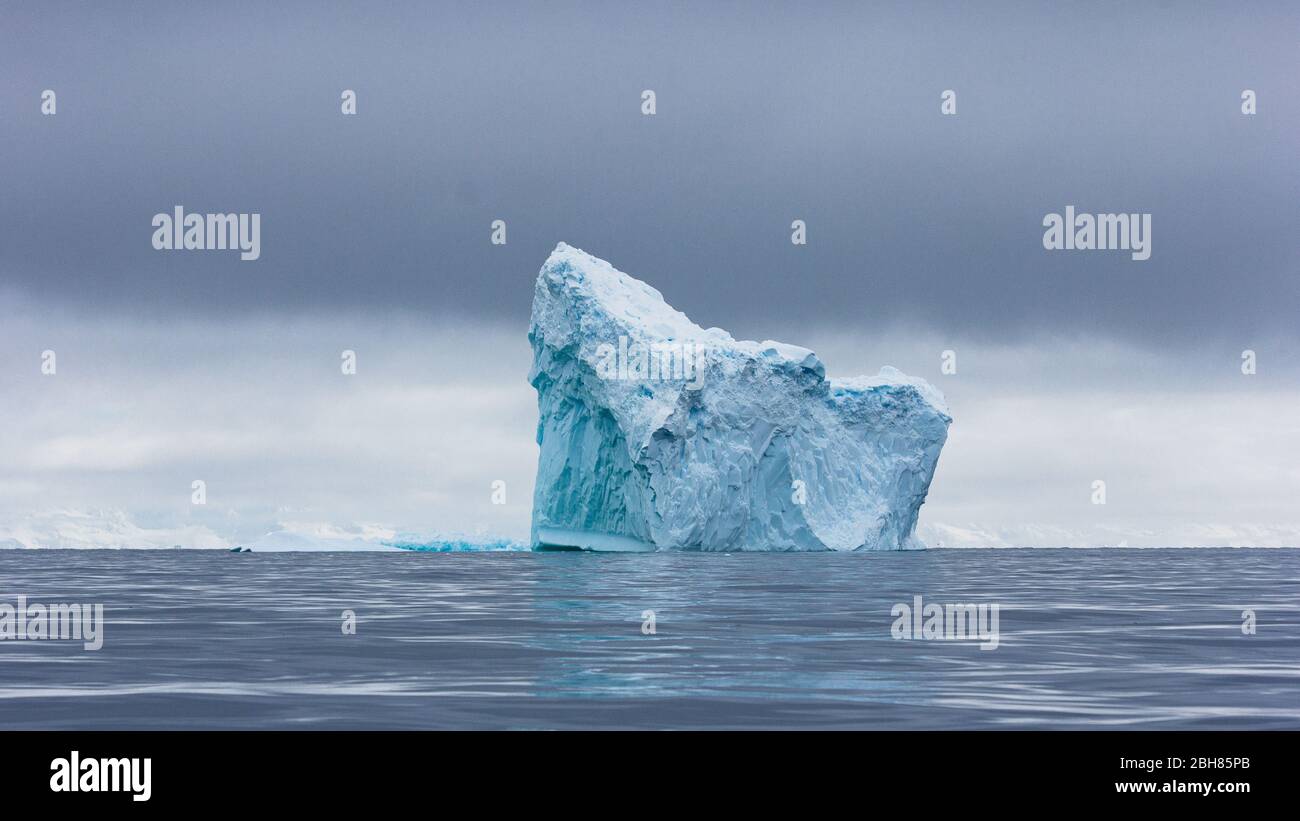 Large iceberg floating in Antarctic waters Stock Photo - Alamy