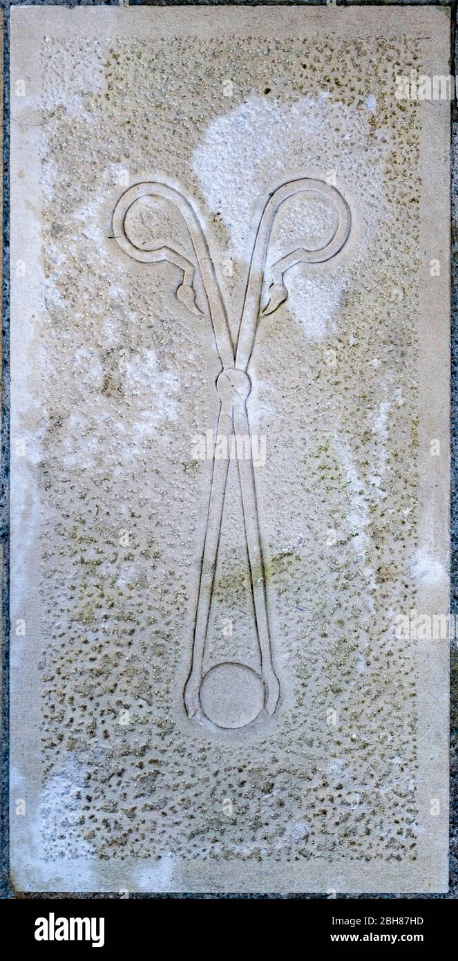 Seething Lane Garden, London, EC3, flag stone with engraving of forceps ...