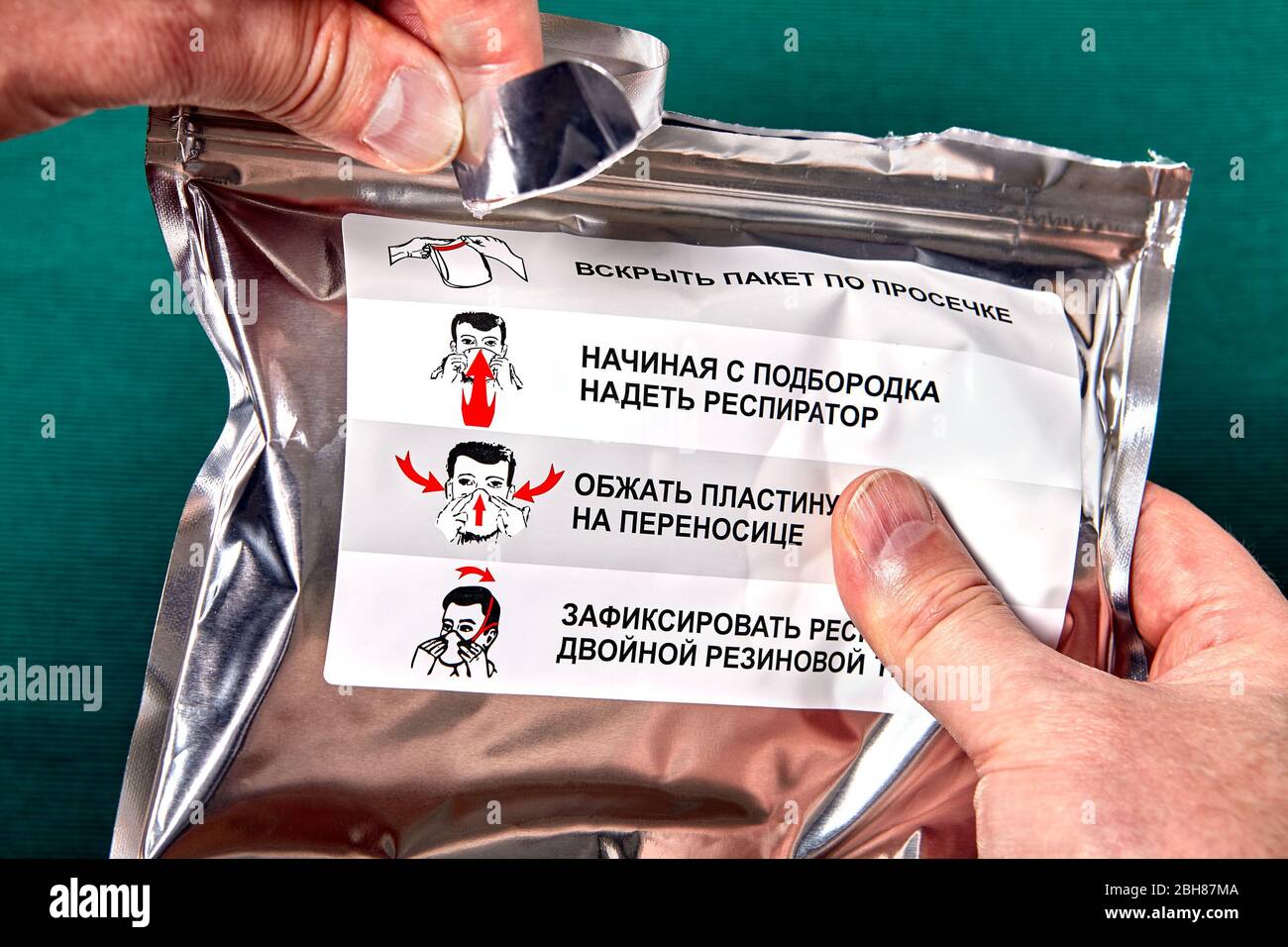 St. Petersburg, Russia - April 16, 2020: Human hands open the package ...