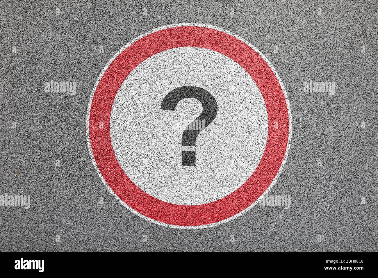 Big round road sign painted at asphalt surfacing Stock Photo - Alamy