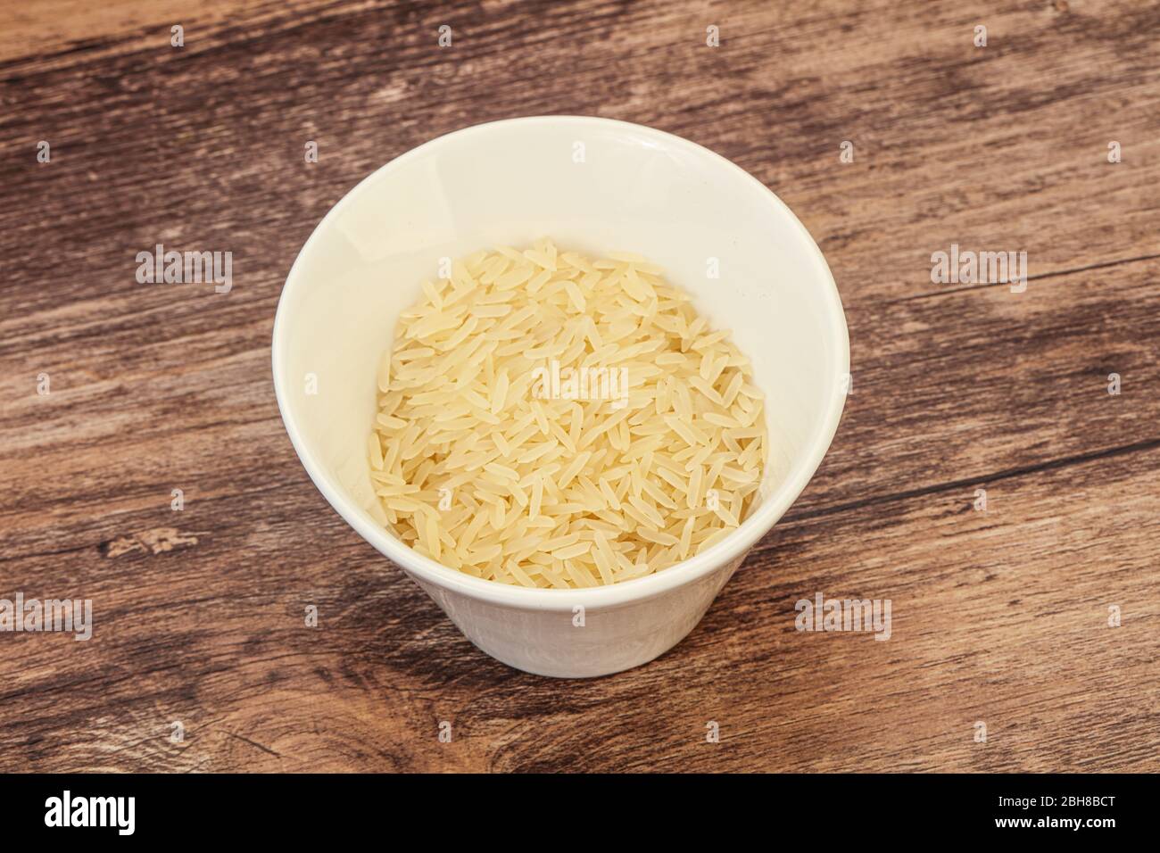 Raw Indian basmati rice in the bowl Stock Photo - Alamy